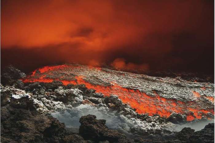 From ancient minerals to new materials: Melting temperature prediction using a graph neural ...